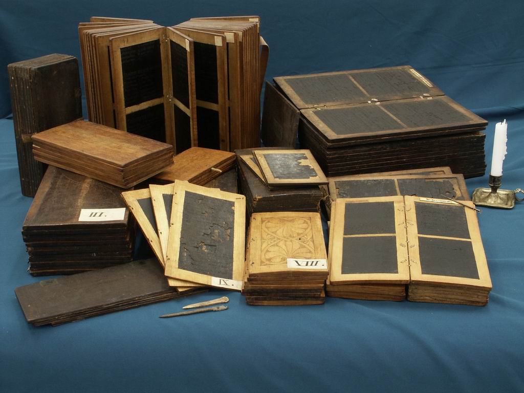 ¿Con qué y sobre que materiales escribían los antiguos romanos? - Agregar